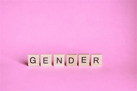 Premium Photo Queer Words Represented By Wooden Letter Tiles Isolated