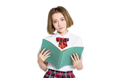 Foto De Adolescente Chinês Jovem Posando Com Livros Isolados No Fundo