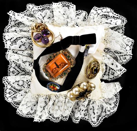 Lot 1617 Four Vintage Costume Jewellery Brooches
