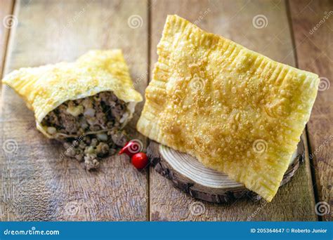 Brazilian Pastry Stuffed With Ground Meat Pieces Of Potato And Pepper