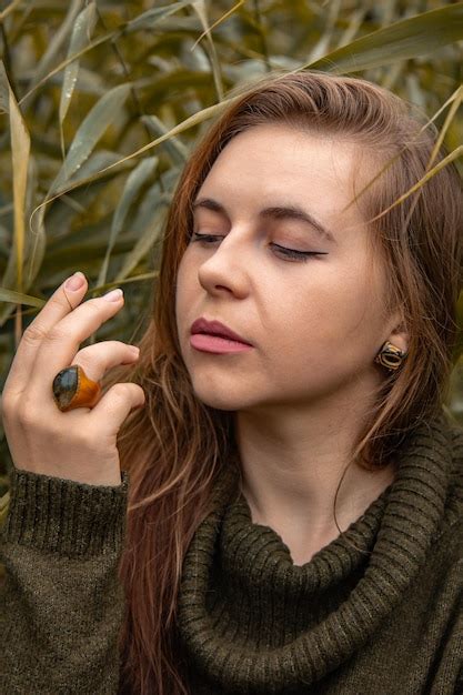 Premium Photo Sexy Leaves Near The Female Mouth The Girl S Tongue