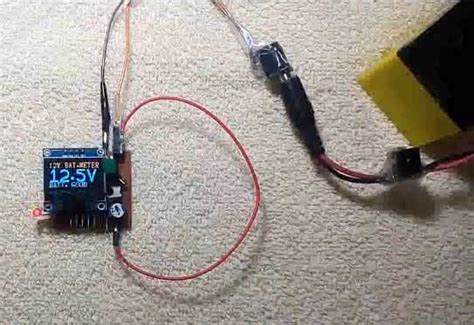 miniature voltmeter with battery voltage monitor