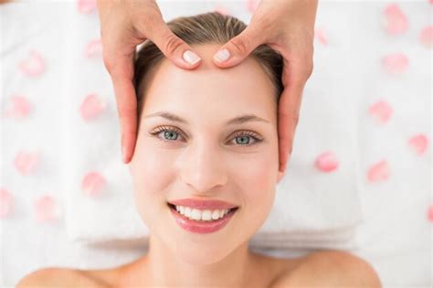 Premium Photo Pretty Blonde Receiving Head Massage