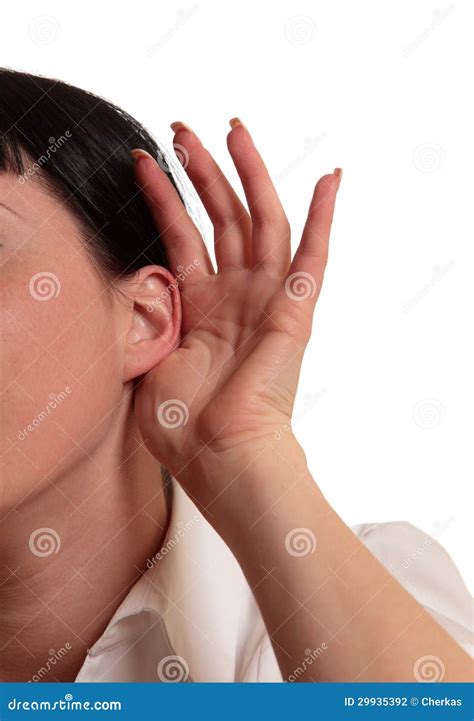 Mujer Que Escucha Foto De Archivo Imagen De Secreto 29935392