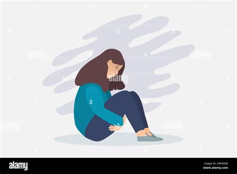 Woman In Depression Young Sad Girl Sitting And Unhappy Hugging Her