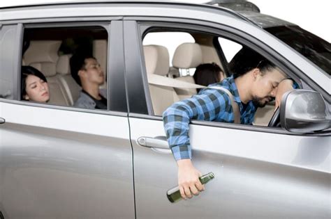 Premium Photo Picture Of Drunk People Asleep In The Car After Doing A