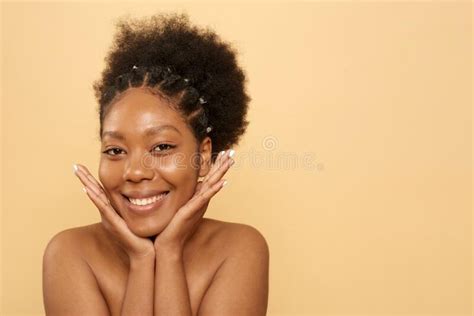 Positive Young Black Woman With Bare Shoulders And Beautiful Skin