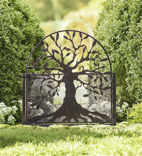 metal arched stand alone garden gate with tree of life design arbors