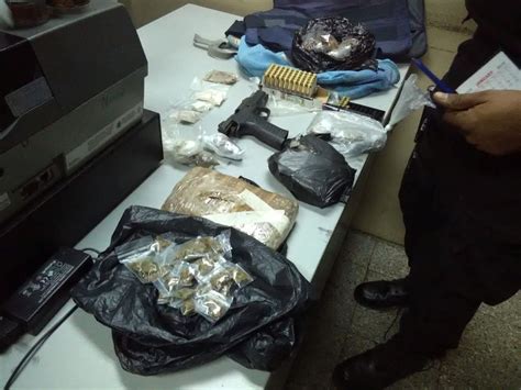 Gun Drugs Ammo Seized In Police Raid Trinidad Guardian