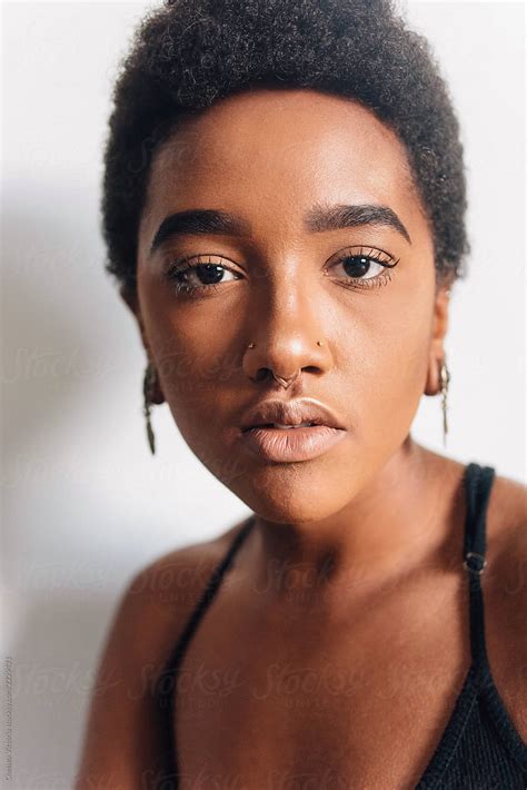 «portraits Of A Beautiful Young Black Woman Against A White Wall Del