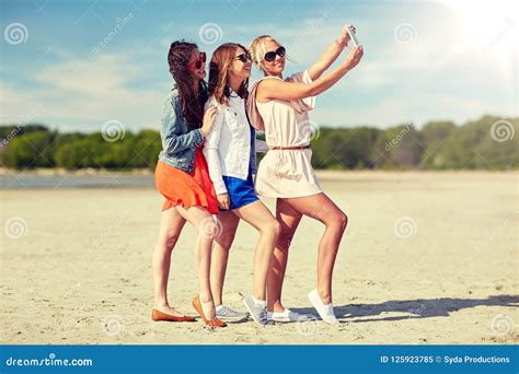 Group Of Smiling Women Taking Selfie On Beach Stock Image Image Of