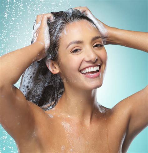 Do A Good Job With Cleanliness A Young Woman Washing Her Hair In The