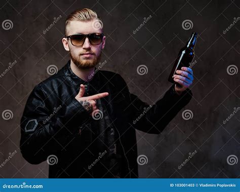 Bearded Male Holds A Bottle With Craft Beer Stock Image Image Of