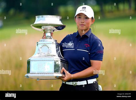 Ruoning Yin Of China Holds The Trophy After Winning The Womens Pga