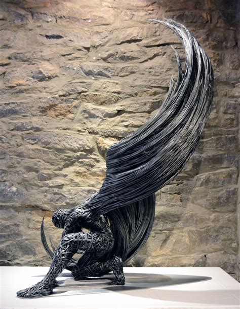 Wire Sculptures Representing The Curves Of Human Body