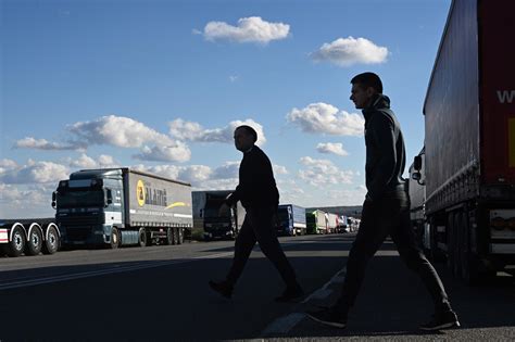Economic Pressure Ukrainian Truckers Queue For Days To Enter Poland