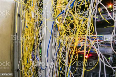 entangled internet wires are in the server room disorderly connection