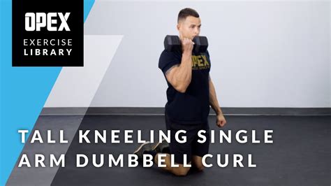 Tall Kneeling Single Arm Dumbbell Curl Opex Exercise Library Youtube