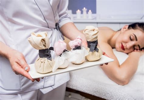 Premium Photo Beautiful Young Woman Enjoying Massage In Spa Salon