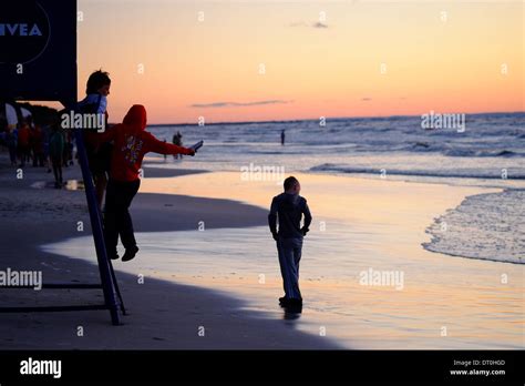 Jantar Town Baltic Shore Seaside In Sunset Teenager Enjoying The