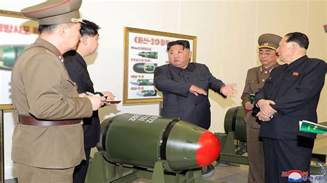 North Korea Unveils New Nuclear Warheads As Us Air Carrier Arrives In