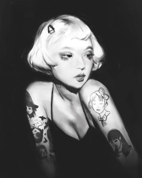 A Black And White Photo Of A Woman With Tattoos