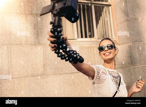 Female Vlogger Recording Content For Her Vlog Young Woman Taking