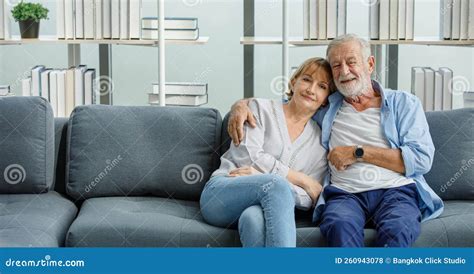 Caucasian Old Senior Romantic Aged Lover Couple In Casual Wear Gray