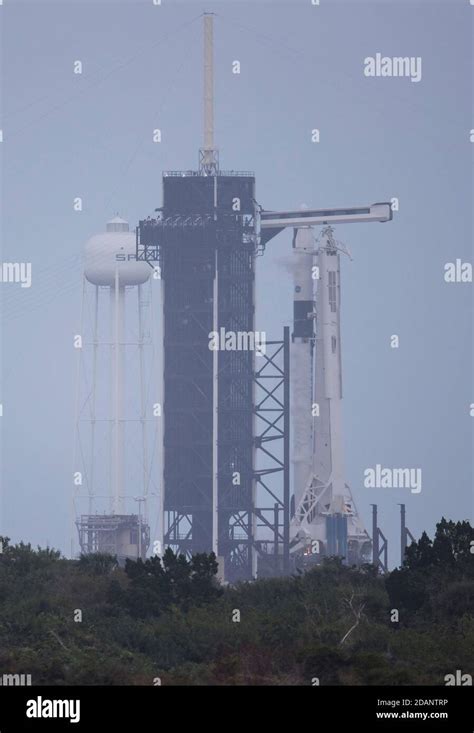 The Spacex Falcon 9 Rocket Carrying The Crew Dragon Spacecraft Onboard