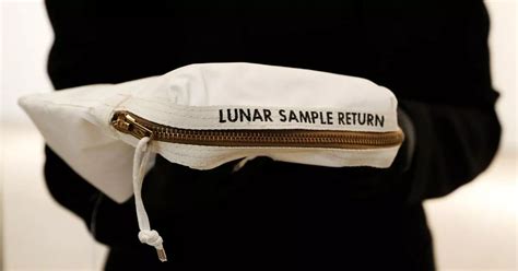Neil Armstrongs Space Bag Containing Traces Of Moon Dust Sells For £1