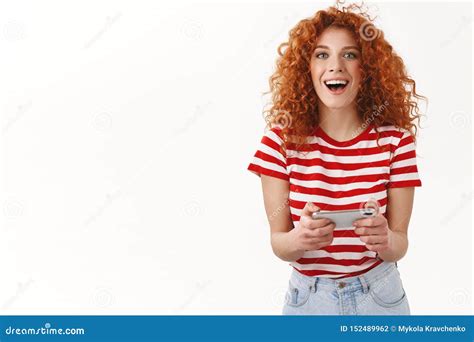 Happy Excited Beautiful Redhead Curly Girl Having Fun Playing Awesome