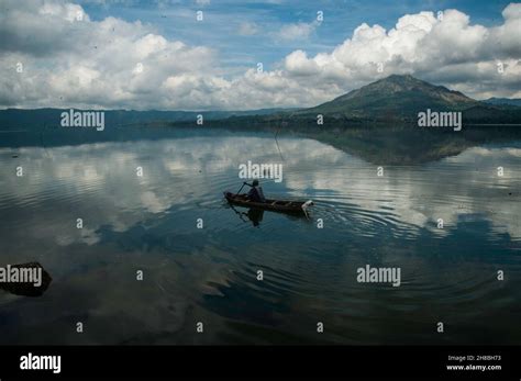 Bali Aga People Seen Crossing The Batur Lake For A Pilgrimages At