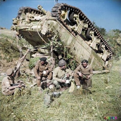 World War Ii Historical Pictures Crew Of An Up Ended M4a1 Sherman