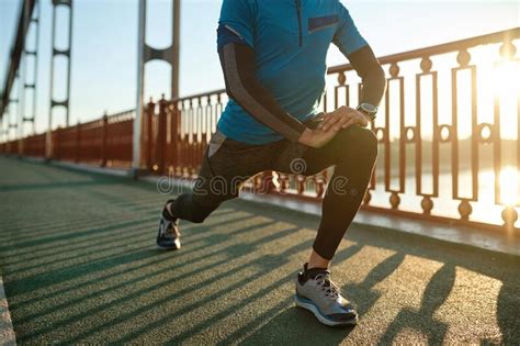 Adult Fitness Man Runner Stretching Legs Before Run Stock Image Image