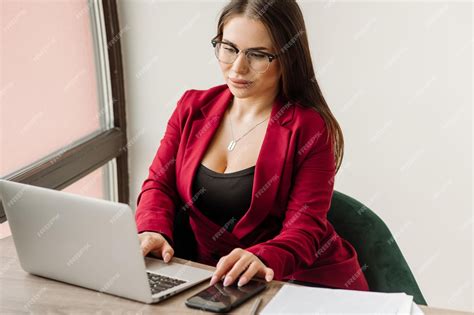 Premium Photo Female Office Worker Or Secretary Is Working With A