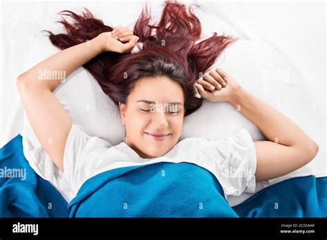 Close Up Of A Beautiful Smiling Young Girl Waking Up Fresh And