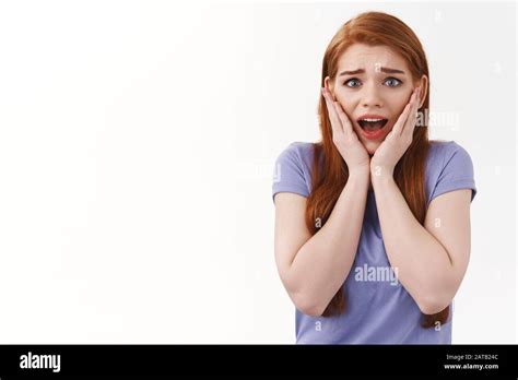 Scared Concerned Alarmed Silly Redhead Woman Looking Terrified