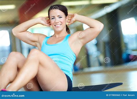 Im Making Great Progress A Beautiful Young Woman Working Out At The