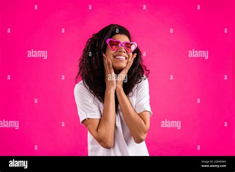 Photo Of Cute Curly Millennial Lady Look Empty Space Wear Spectacles