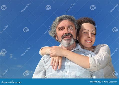 Portrait Of Woman Embracing Her Father Stock Image Image Of Grey
