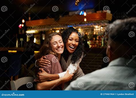 Happy Young Multiracial Group Of Friends In Casual Clothing Hugging At