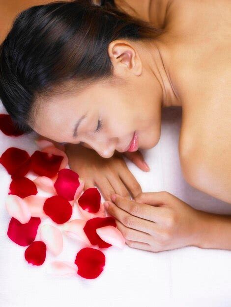 Premium Photo Woman Having Spa Treatment While Lying On Massage Table