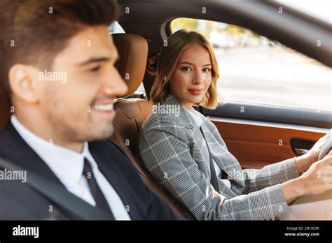 Image Of Young Caucasian Successful Businesslike Man And Woman In