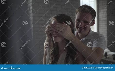 Man Closes His Is Girlfriend`s Eyes To Make Surprise Stock Video