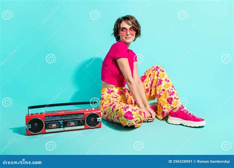 Full Length Photo Of Dreamy Shiny Woman Dressed Flower Print Trousers