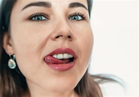 Premium Photo Sensual Tongue On A Womans Face Closeup Sexuality
