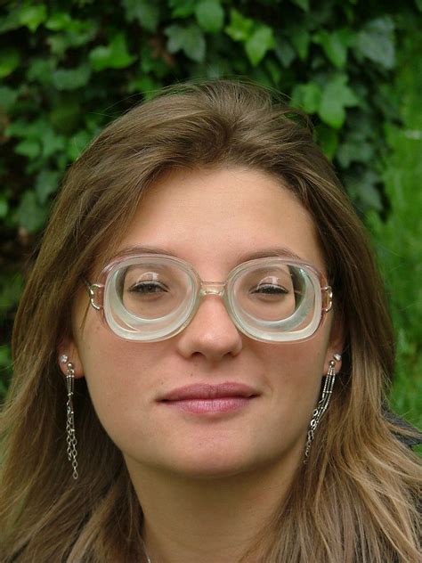 Gael Wearing Strong Thick Glasses With Big Dangling Earrings A Photo
