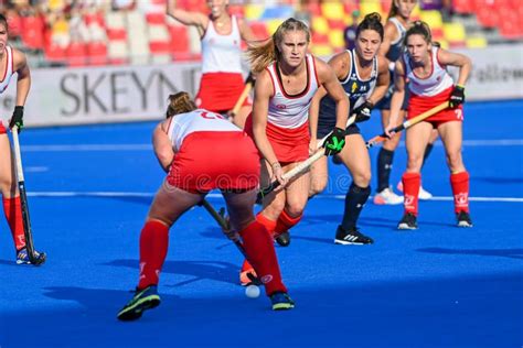 Players In Action In The Argentina Vs Canada Field Hockey Match At The