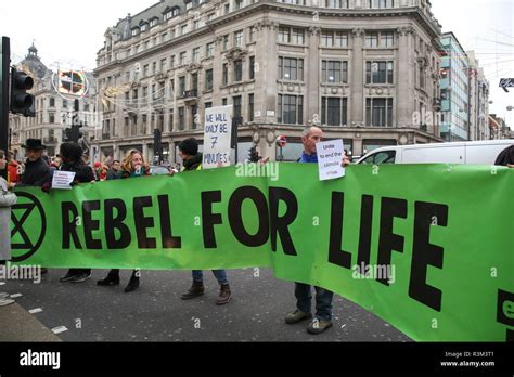 Protesters Seen Holding A Huge Banner During The Protest Extinction