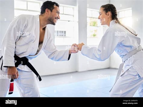 Karate Motivation And Fist Bump With A Man And Woman Fighter Training
